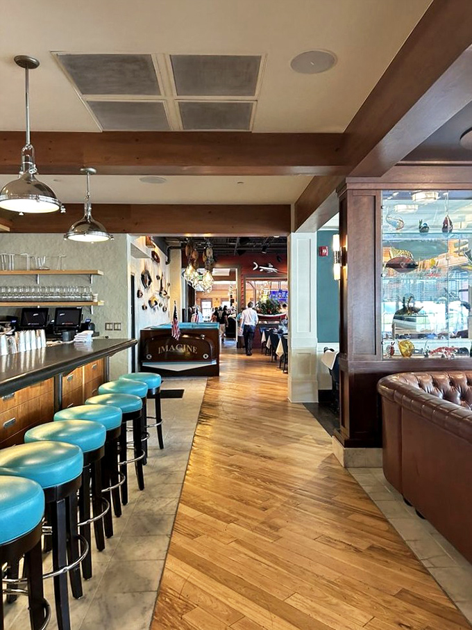 Polished wood, aqua accents, and maritime elegance&mdash;the interior feels like stepping aboard a luxury yacht where calories simply don't count.