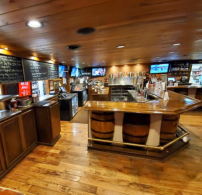 A bar that means business&mdash;wooden barrels, gleaming taps, and the promise of cold beer to wash down those legendary burgers.