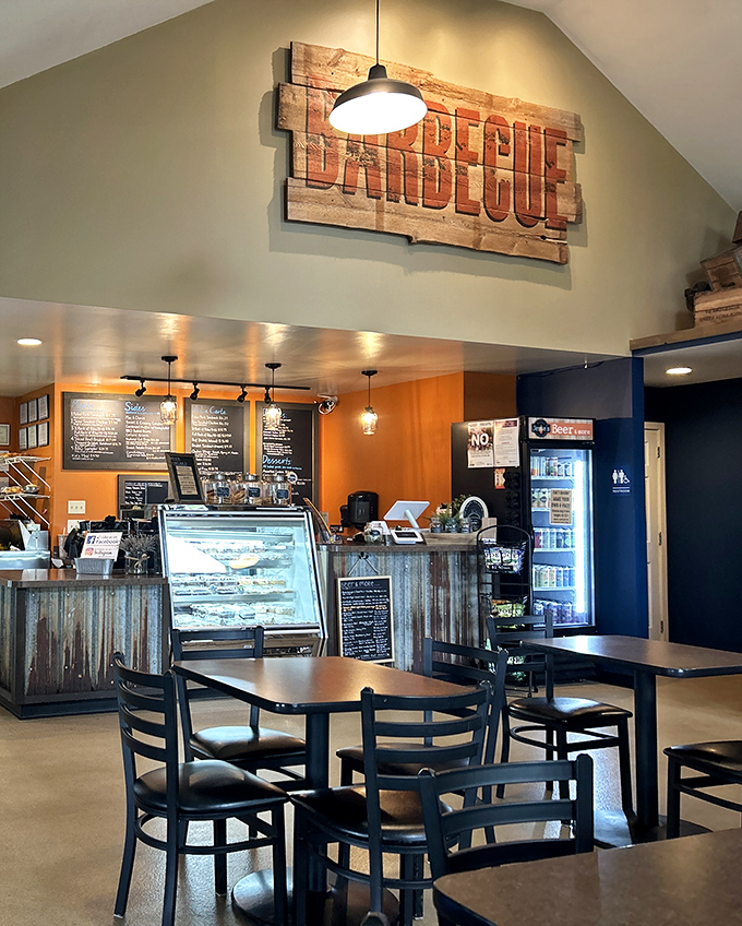 Inside, classic diner charm meets homey comfort with checkered floors, blue vinyl chairs, and that glowing "Good Eats" sign that never lies.