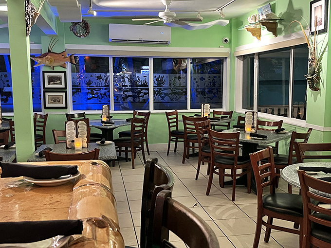 Mint green walls and nautical touches create the perfect Florida Keys vibe. This dining room says "relax, you're on island time" without a single flip-flop requirement.