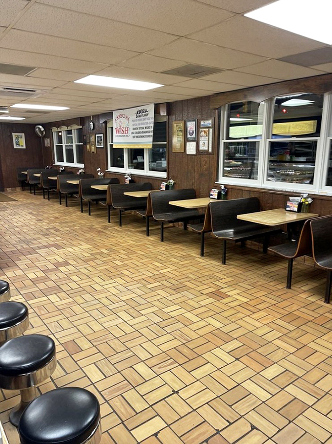 Wood-paneled walls and classic seating create the perfect backdrop for serious donut contemplation and conversation.