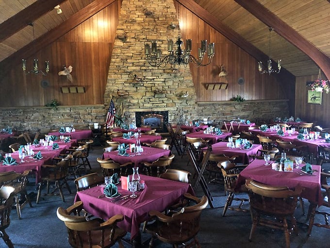 Cathedral ceilings, stone fireplace, burgundy tablecloths &ndash; this isn't just dining, it's a Midwestern sanctuary where memories are made between courses.