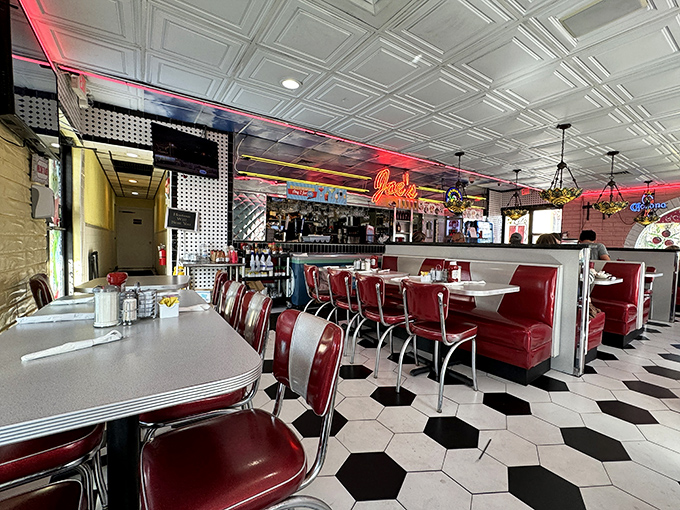 Classic diner perfection with red vinyl booths and a checkerboard floor&mdash;this isn't just a restaurant, it's a time machine that happens to serve incredible food.