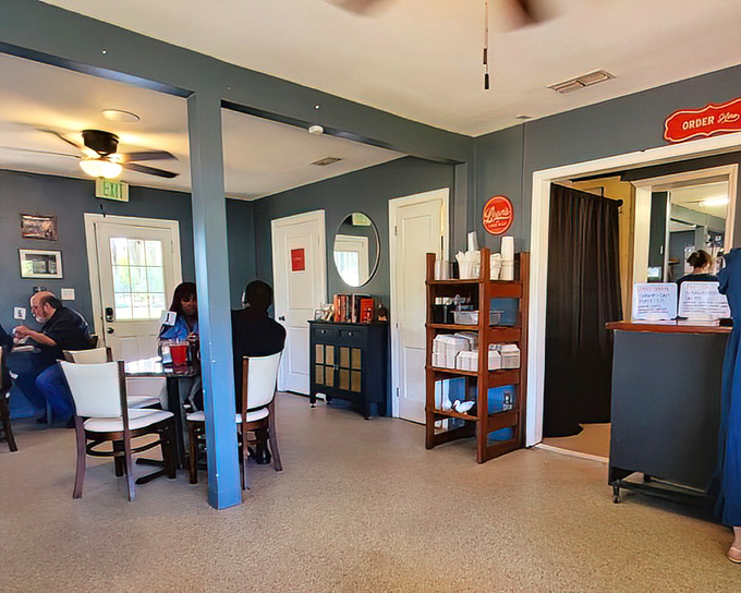 Step inside and the world slows down. Blue-gray walls, circular mirrors, and cozy seating invite you to linger over every delicious bite.