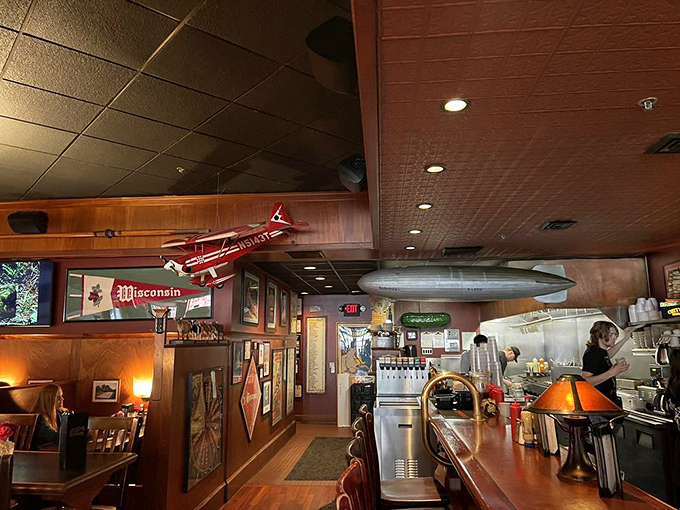 Model airplanes and zeppelins hover above diners like culinary guardian angels. This isn't just decor&mdash;it's a promise that your taste buds are about to take flight.