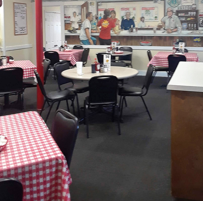 Classic red-checkered tablecloths and no-nonsense seating tell you everything: this place prioritizes what's on your plate, not what's on their walls.