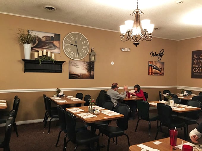 Simple elegance defines the dining room, where that oversized clock reminds you to slow down and savor. Time moves differently when there's comfort food on the horizon.