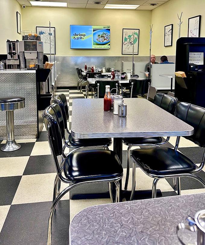 Classic black and white checkered floors, chrome-trimmed tables, and that unmistakable diner energy. This isn't interior design—it's breakfast theater in its purest form.
