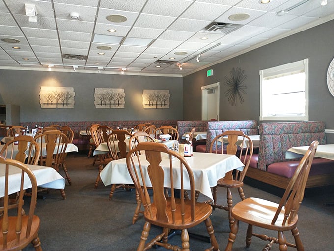Classic Wisconsin supper club ambiance in full effect&mdash;wooden chairs, white tablecloths, and the promise of carnivorous delights to come.