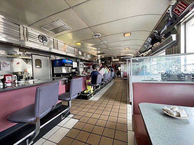 Where conversations flow as freely as the coffee – the quintessential American diner experience with counter seating and cozy booths.