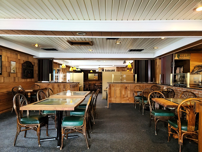 Warm wooden paneling and rattan chairs create a nautical haven where you can almost hear seagulls despite being hours from any coast.