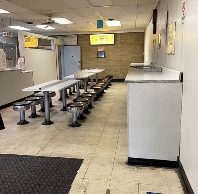 No-frills dining at its finest. Those metal stools have supported generations of donut enthusiasts, each one witnessing countless sugar-fueled epiphanies.