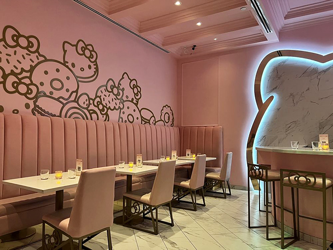 Plush pink booths and Hello Kitty murals create an atmosphere that's part luxury lounge, part childhood dream. The designers clearly understood the assignment.