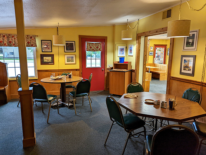 Inside, yellow walls and wooden tables create that "grandma's kitchen" vibe where calories don't count and coffee refills flow freely.