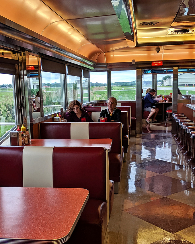 Red vinyl booths and checkerboard floors transport you to simpler times. The view of the airfield adds a dash of adventure to your meal.