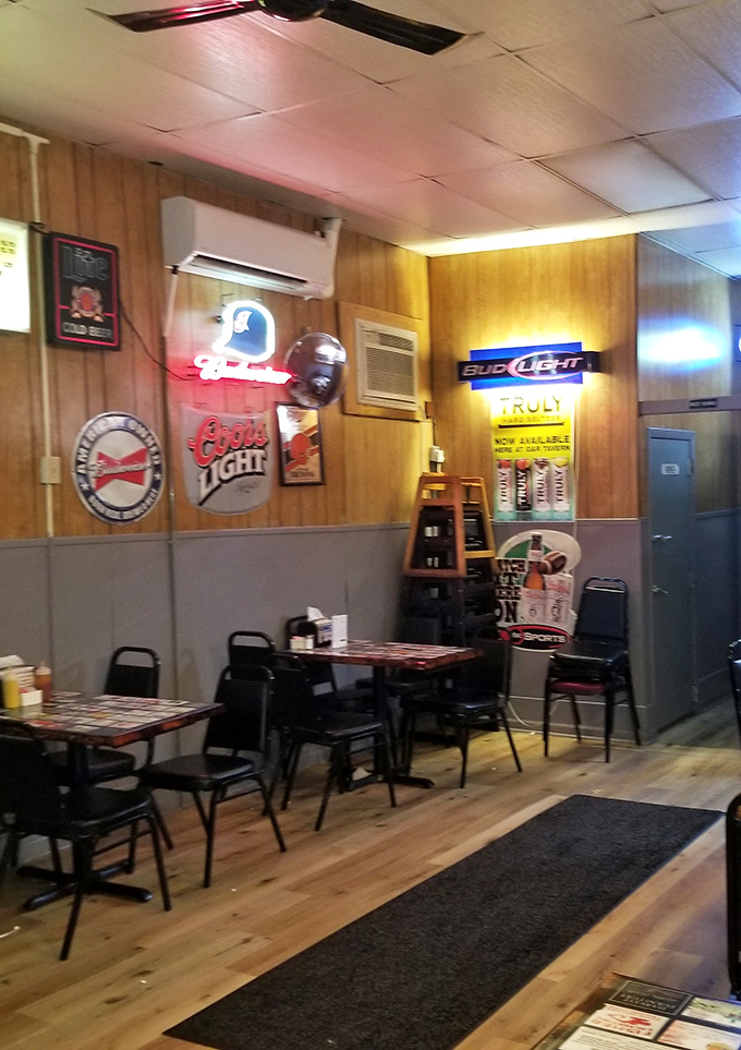 Classic wood paneling, neon beer signs, and simple tables create the perfect no-frills backdrop for a culinary revelation. This isn't Instagram bait&mdash;it's authenticity.