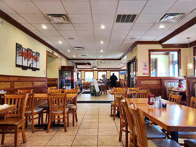 Classic wooden chairs and clean lines create that quintessential diner atmosphere where conversations flow as freely as the coffee.