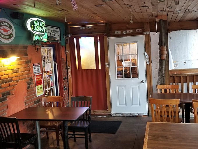 Step inside where exposed brick meets neighborhood charm, creating the perfect backdrop for serious seafood conversations.