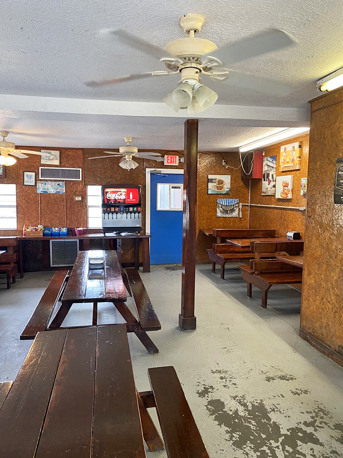 Wooden picnic tables and paneled walls create a no-frills atmosphere where the only thing that matters is what's on your plate.