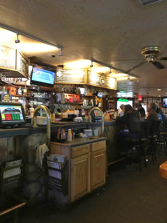 The bar at Charlie Clark's feels like the living room of that friend who always has the best stories&mdash;and the best drinks to go with them.