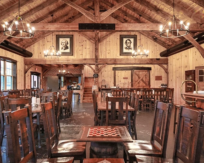 Vaulted ceilings, wooden beams, and checkerboard tables create the perfect atmosphere for serious barbecue contemplation and inevitable food comas.
