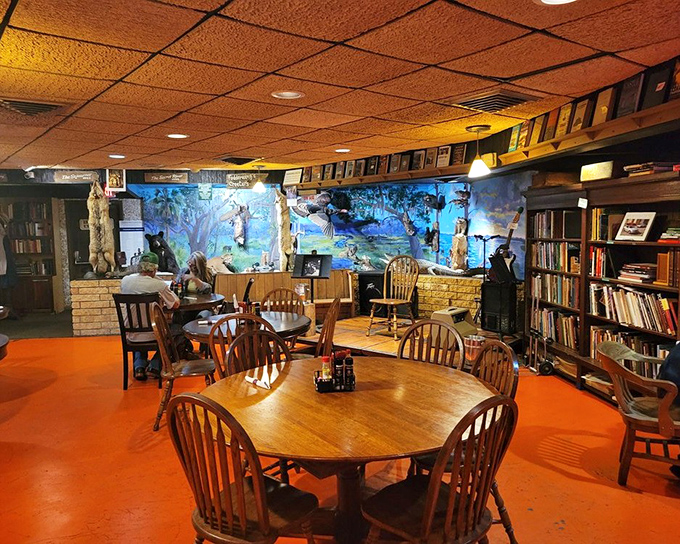 Inside, orange floors and wooden tables create a time capsule of Old Florida. The bookshelves and wildlife displays aren't decoration&mdash;they're the restaurant's soul.