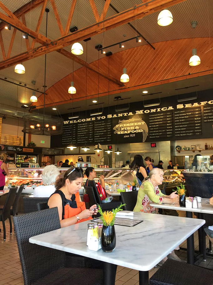 Where wooden beams meet oceanic dreams. The market's interior manages that rare feat&mdash;making a commercial space feel like a fisherman's welcoming home.