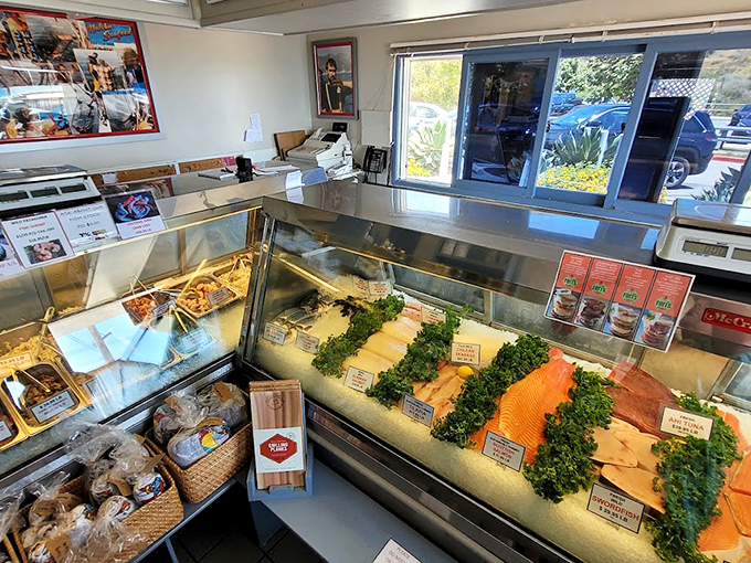 Gleaming display cases showcase the day's oceanic bounty, a seafood lover's dream where every fillet tells a story of early morning catches.