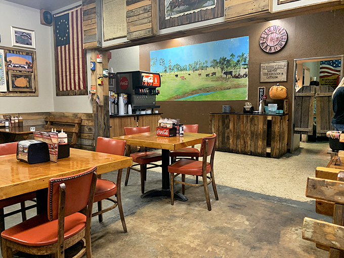 Inside, Americana adorns the walls while red chairs pop against wooden tables, creating that perfect "come as you are, leave fuller than you arrived" barbecue joint atmosphere.