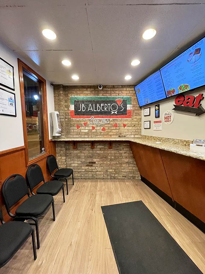 Step inside and the no-frills charm hits you immediately. This waiting area has witnessed decades of pizza anticipation and post-meal satisfaction.