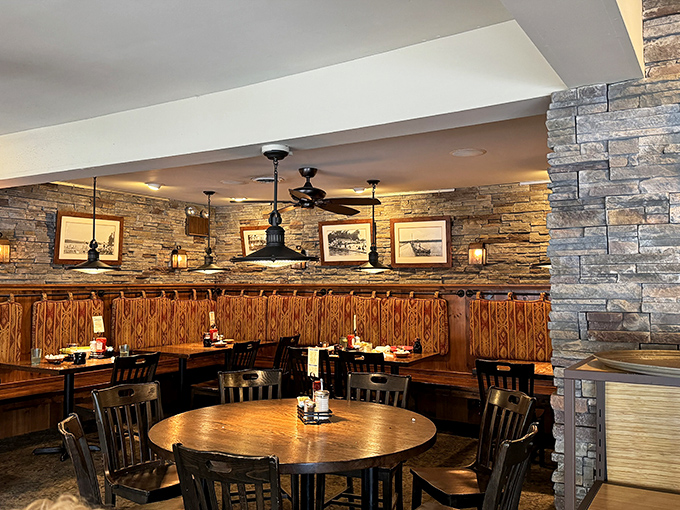 Rustic elegance done right. Stone walls meet wooden booths in a dining room that feels like the mountain lodge you've always dreamed about.