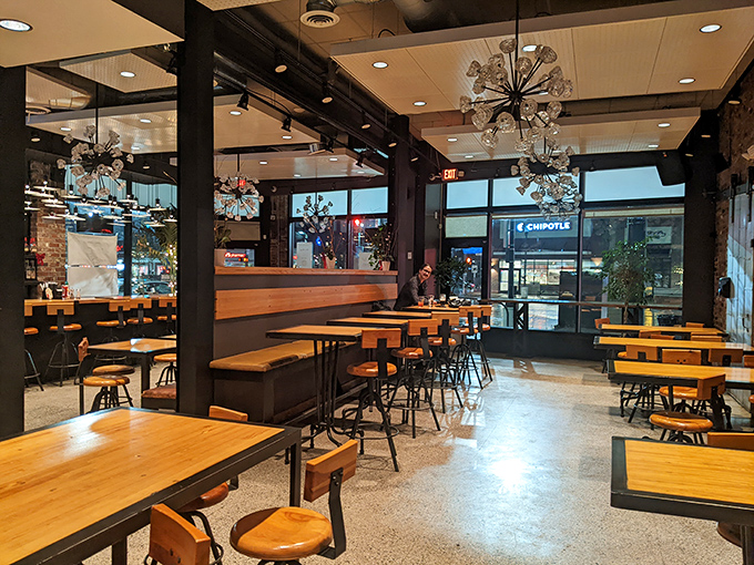 Industrial chic meets comfort food paradise in this spacious dining room where cornbread dreams come true.