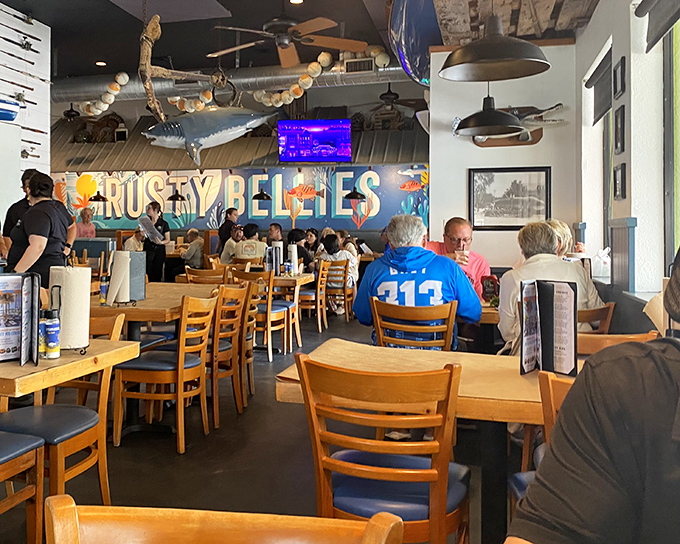 Inside, wooden tables and nautical d&eacute;cor create the perfect backdrop for seafood feasting, while a giant fish watches over diners.