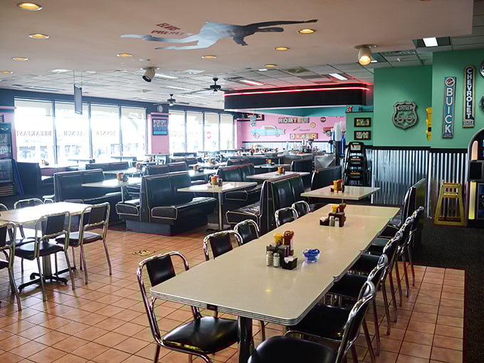 Suspended sharks keep watch over diners below, creating an underwater ambiance that says, "Yes, we're serious about seafood" without being pretentious about it.