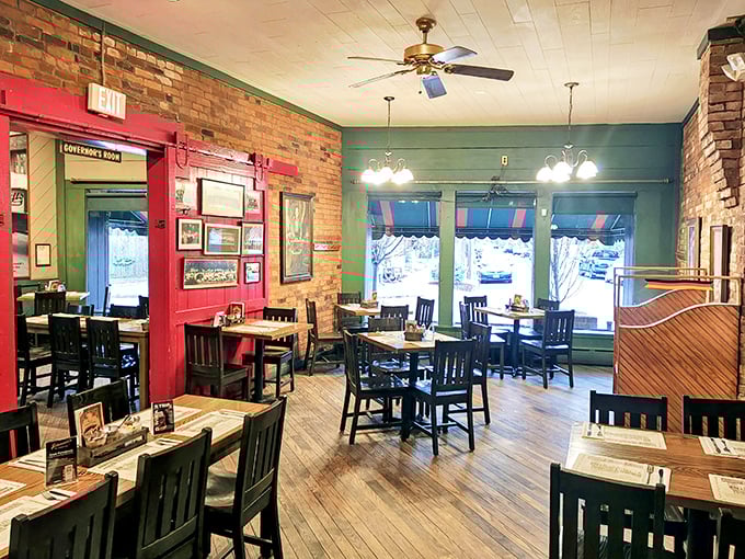 Exposed brick walls and warm wooden tables create the perfect atmosphere for memorable meals.