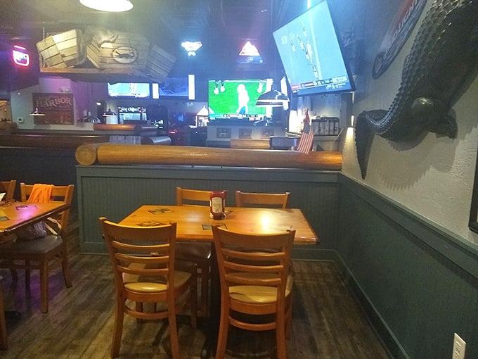 Where sports fans and food lovers unite under the watchful eye of mounted gators. The wooden tables have probably heard more fishing tales than the boats in Tampa Bay.