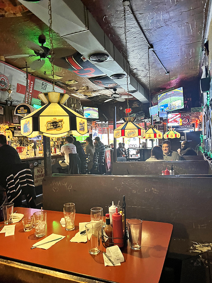 Weathered wood tables and fishing memorabilia create the kind of atmosphere where every meal feels like a celebration.