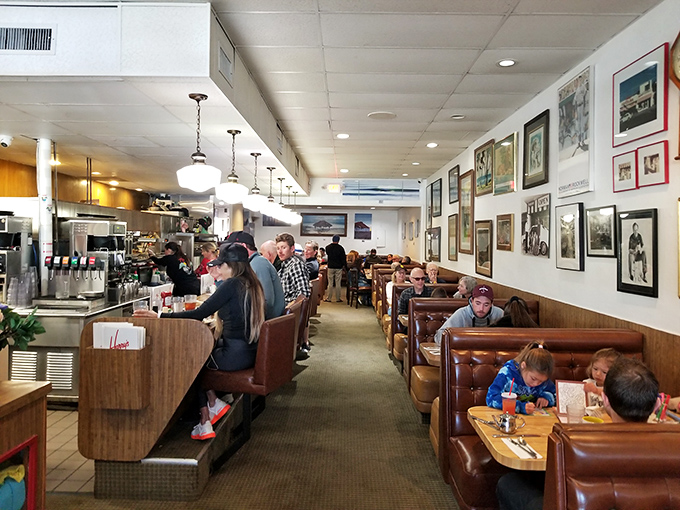 Step inside and discover where vintage charm meets modern comfort in perfectly worn leather booths.