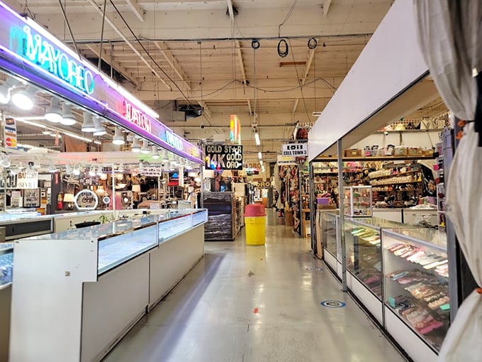 Gleaming display cases line the corridors like a treasure map waiting to be followed. Each storefront beckons with possibilities.