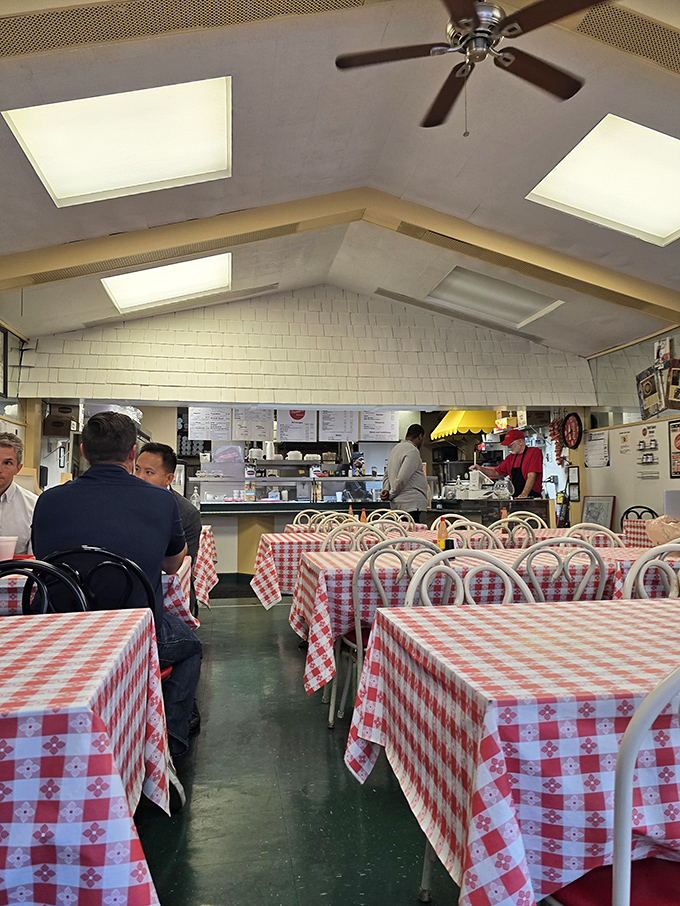 Red and white checkered tablecloths set the stage for unpretentious dining&mdash;where conversations flow as freely as the coffee in this Nashville institution.