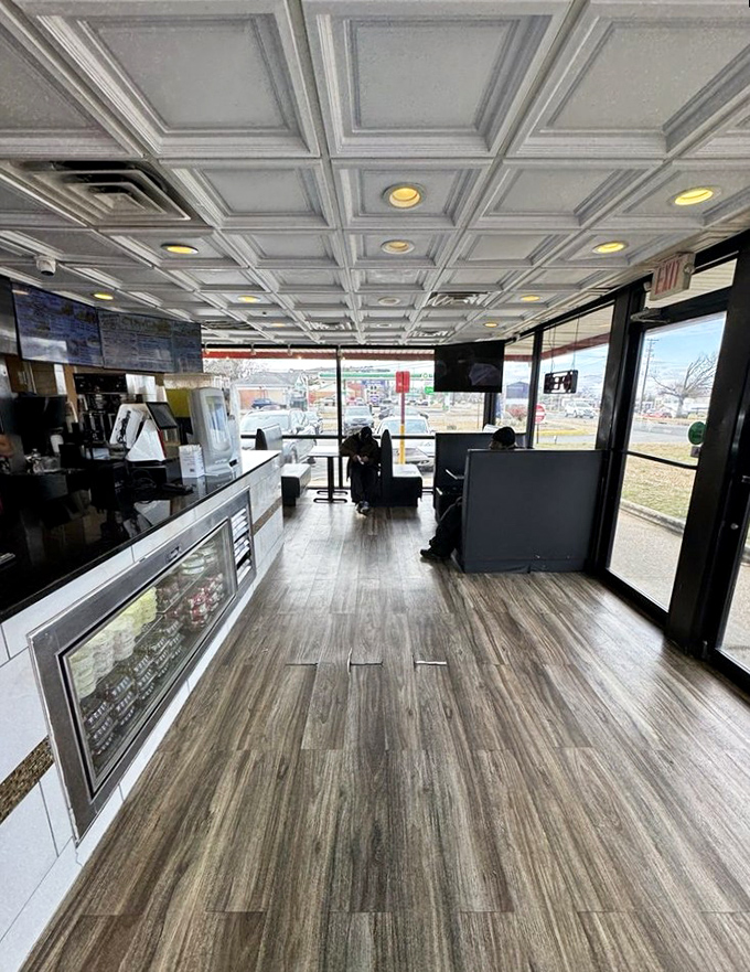 Inside, the clean, modern space with coffered ceiling offers a no-nonsense dining experience where the food, not the decor, does all the talking.