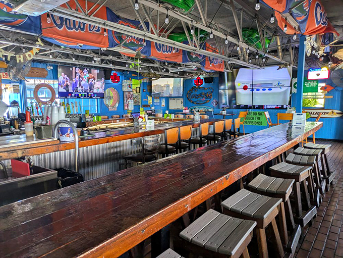 The interior bar is a colorful love letter to Florida's nautical heritage, where every flag and memento tells a story worth hearing over a cold drink.