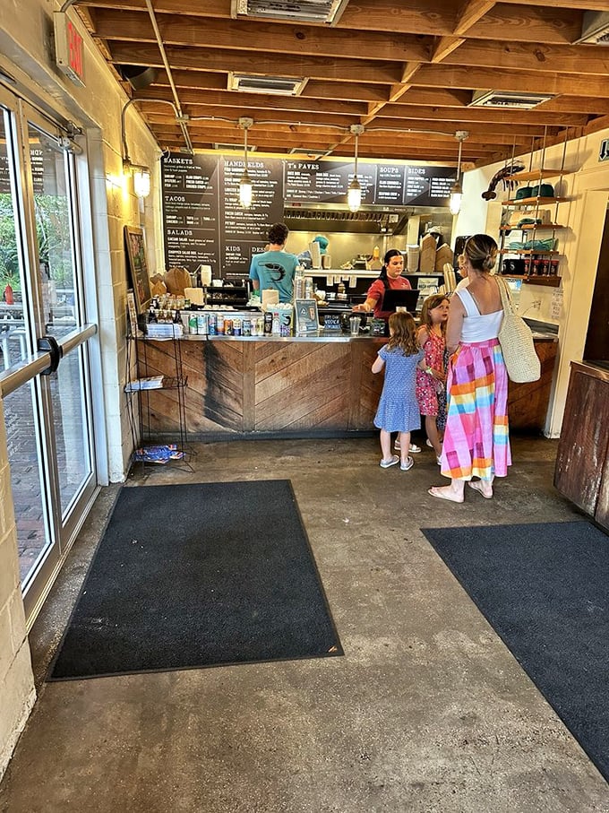 Counter service simplicity with a side of anticipation. The exposed wooden beams and chalkboard menu create that "you've discovered something special" feeling.
