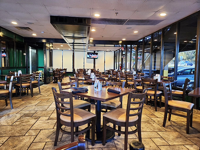 Simple wooden tables, comfortable chairs, and plenty of space &ndash; Malone's interior says, "We're here for the food, not the fancy."