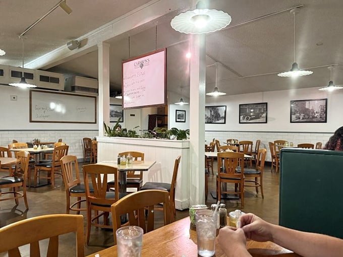 Simple wooden chairs, vintage photos, and the hum of conversation&mdash;this isn't interior design, it's deli authenticity that money can't buy.