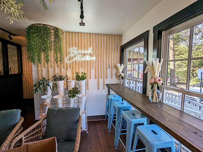 Inside, hanging plants cascade from wooden slat walls while blue metal stools invite you to perch and ponder life's most important question: sweet or savory?