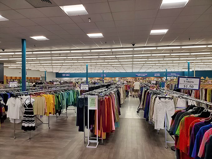 A sea of colorful clothing stretches as far as the eye can see. This isn't just shopping&mdash;it's a textile safari through decades of fashion.