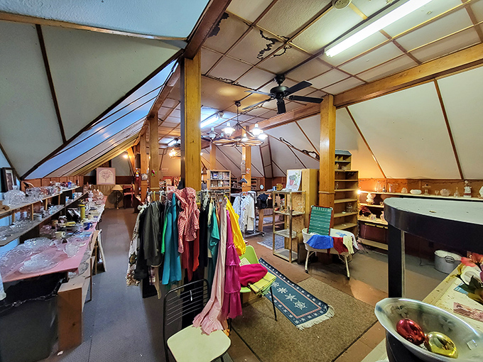 Up in the attic, colorful vintage clothing hangs alongside shelves of curiosities, creating the kind of magical space where time seems wonderfully suspended.