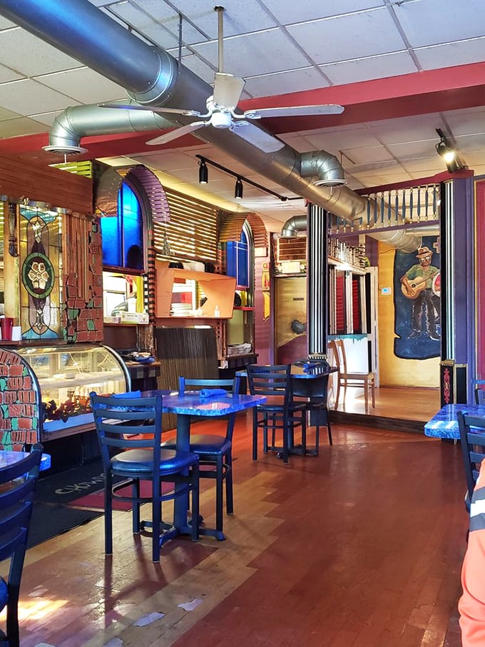 Step inside and the artistic explosion hits you&mdash;stained glass, vibrant colors, and exposed ductwork create a space where seafood meets creativity.