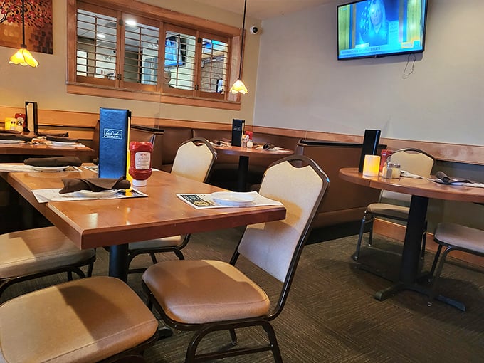 Cozy wooden tables bathed in warm pendant lighting create that "everybody knows your name" vibe, minus the Boston accent.